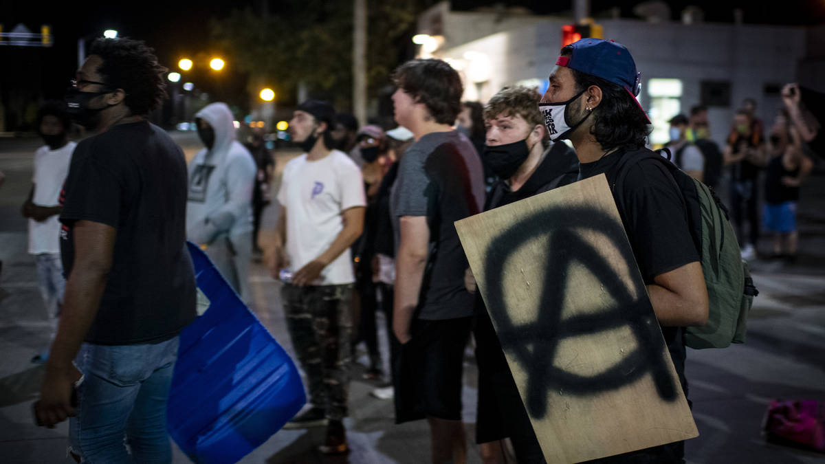 Teen charged over fatal shootings amid racial equality protests in ...