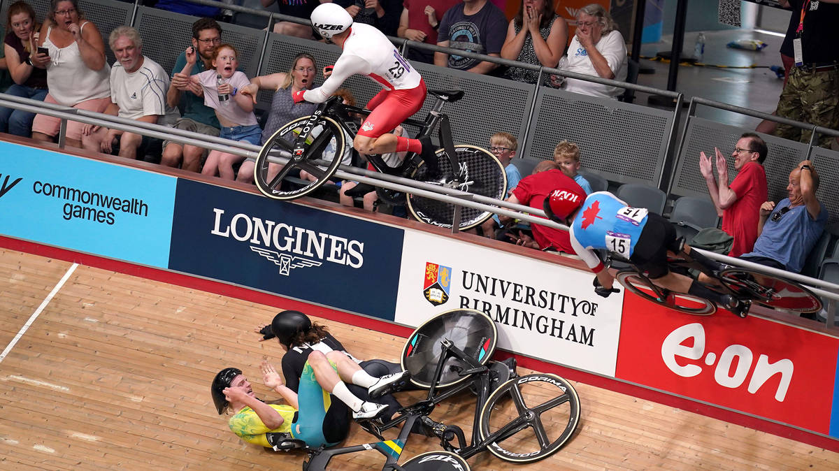 English cyclist flies into crowd and leaves fan 'covered in blood' in ...