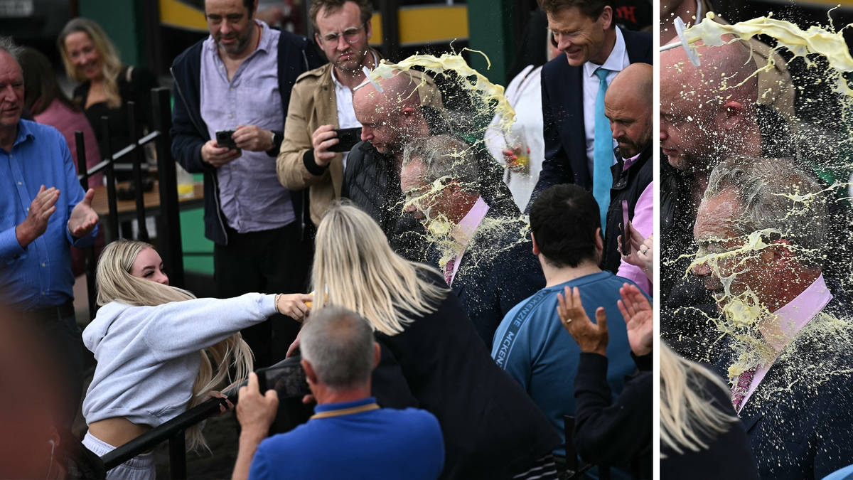 Two arrested after Nigel Farage has McDonald's milkshake thrown into ...