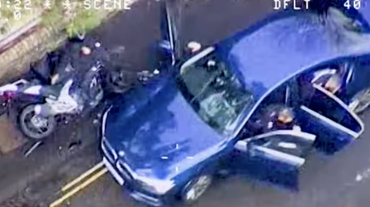 Moment police ram motorbike thief off the road after 80mph chase ...