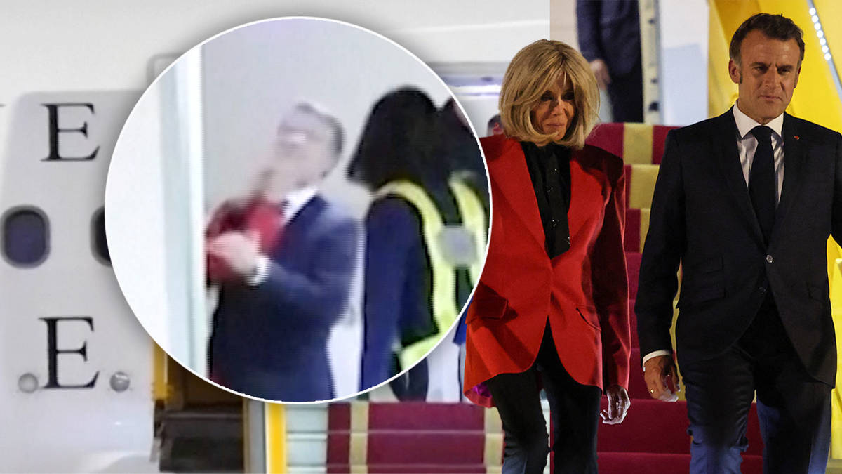 Moment Emmanuel Macron's wife appears to push French president in the ...