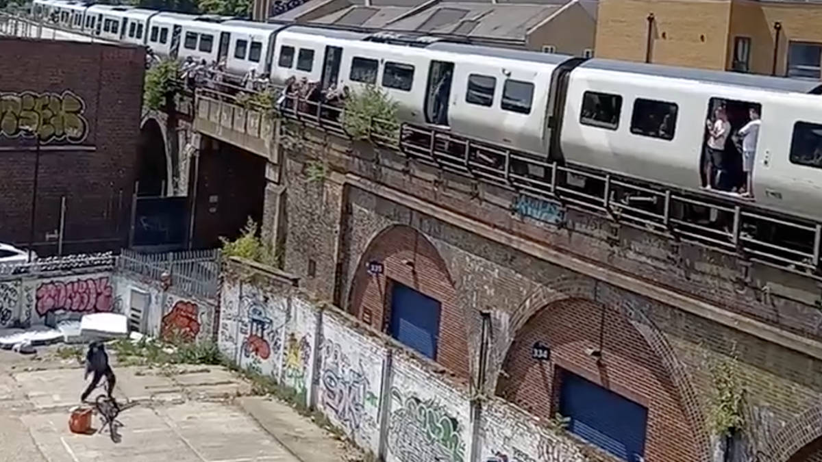 Delivery rider hailed a hero for tossing drinks into stranded ...