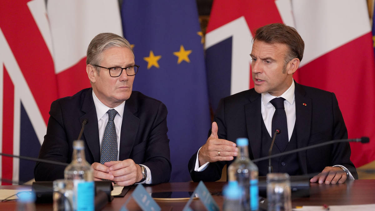UK and France vow joint nuclear response in pact 'designed as warning ...