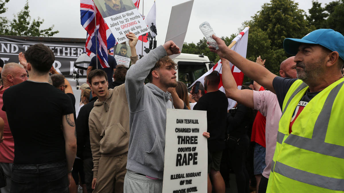 Hundreds attend anti-immigration protest outside Norwich asylum hotel | LBC