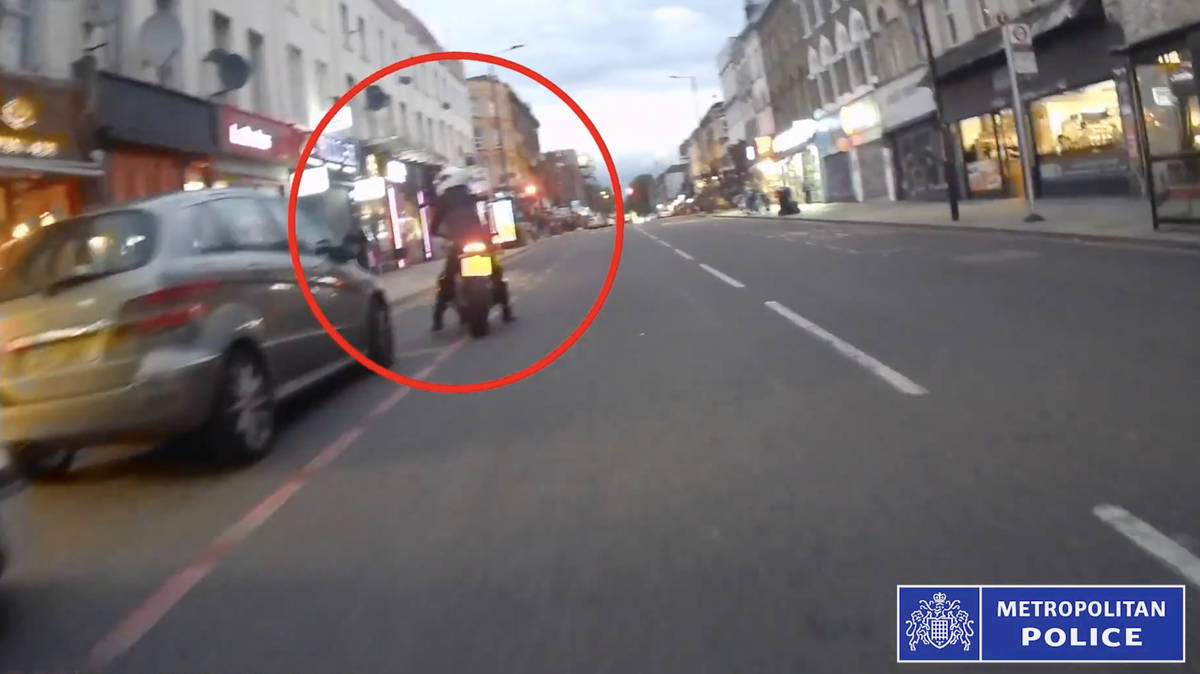 Watch moment 'hitman' on motorbike opens fire on east London restaurant ...