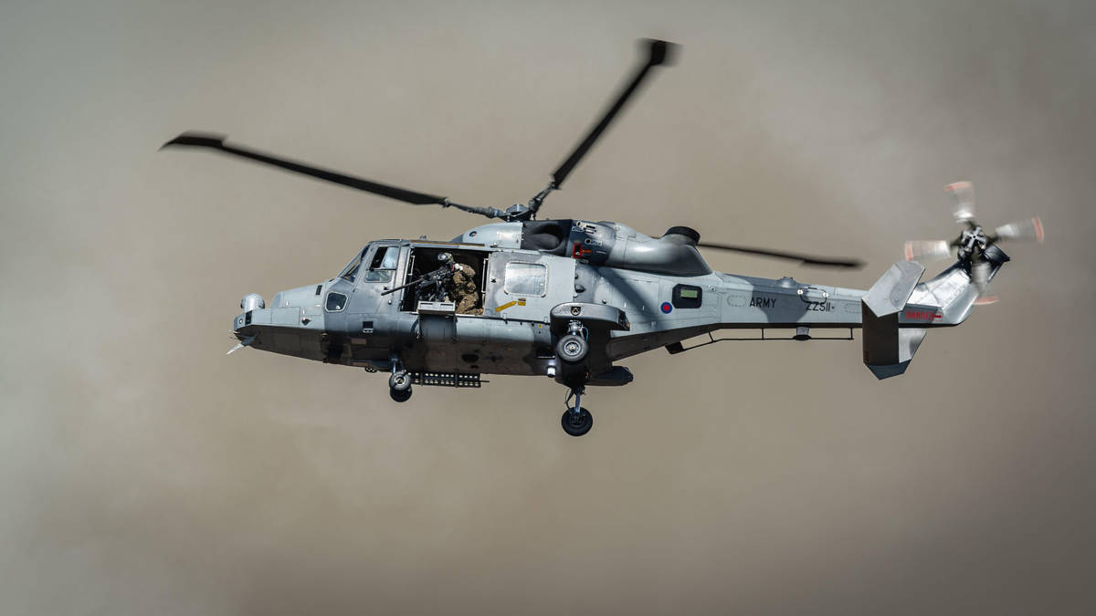 Flying backwards at 40 knots, Royal Marine sniper takes out drug ...