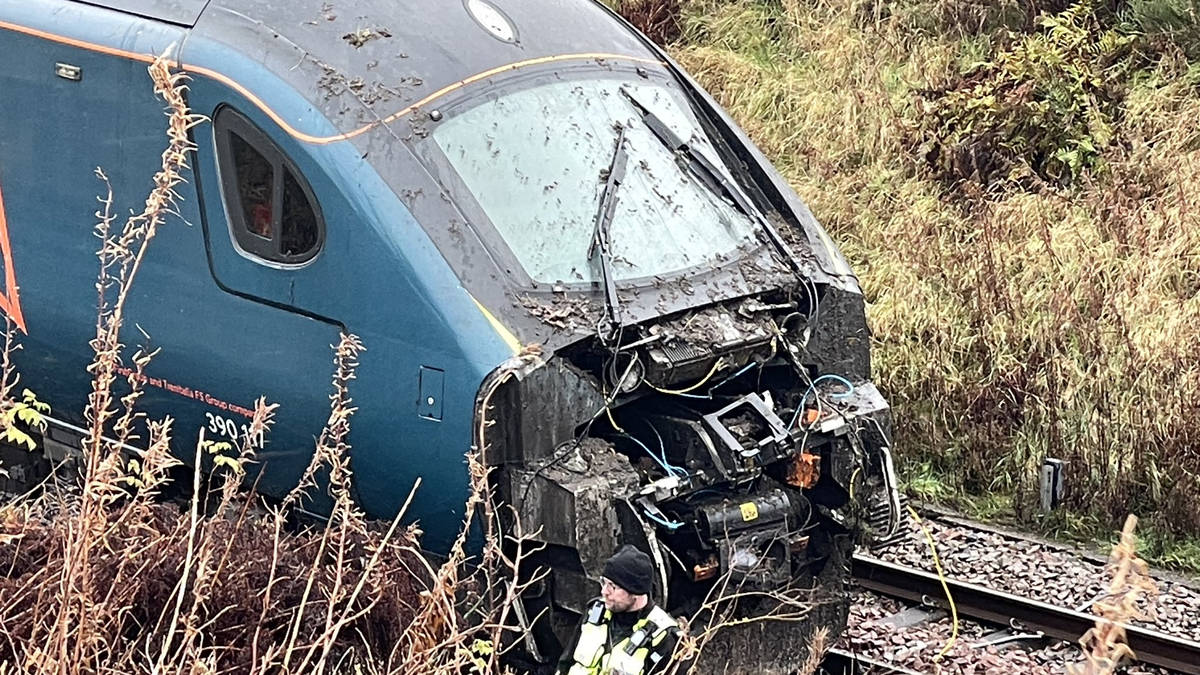 Four hurt after train derails due to landslide – with travel chaos set ...