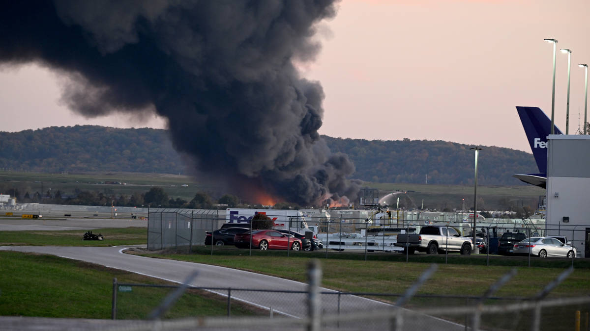 At least 12 dead, including a child, after US cargo plane crashed 'when ...