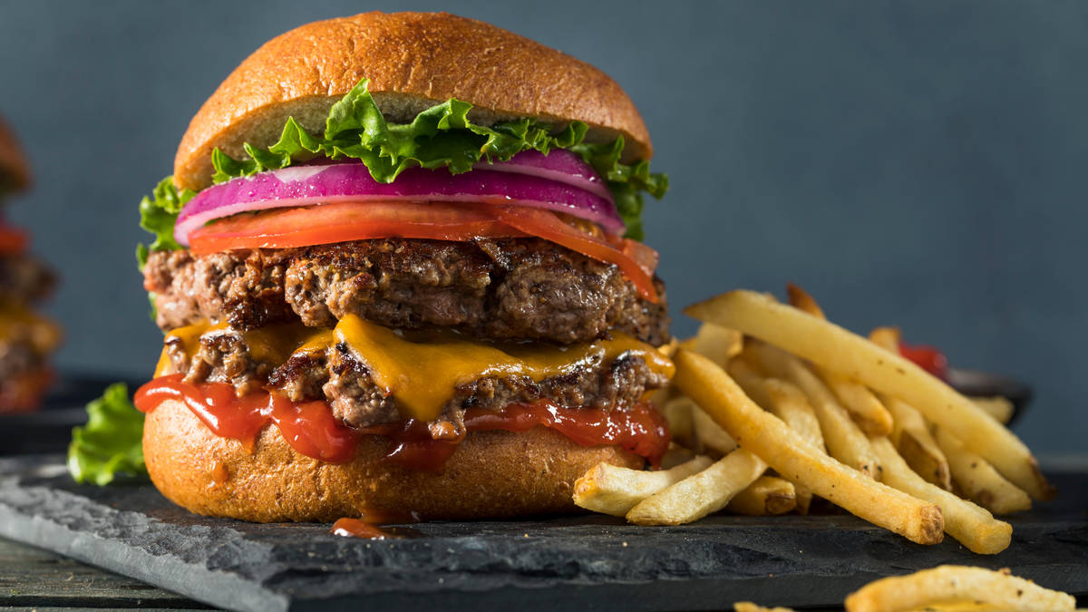 Man, 22, fights for life after swallowing a whole burger without ...