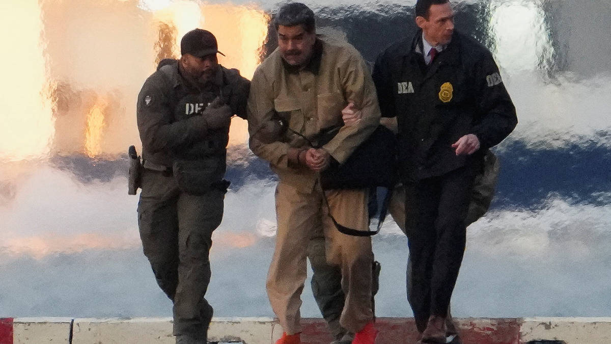 Shackled Nicolas Maduro seen in prison uniform while arriving in court ...