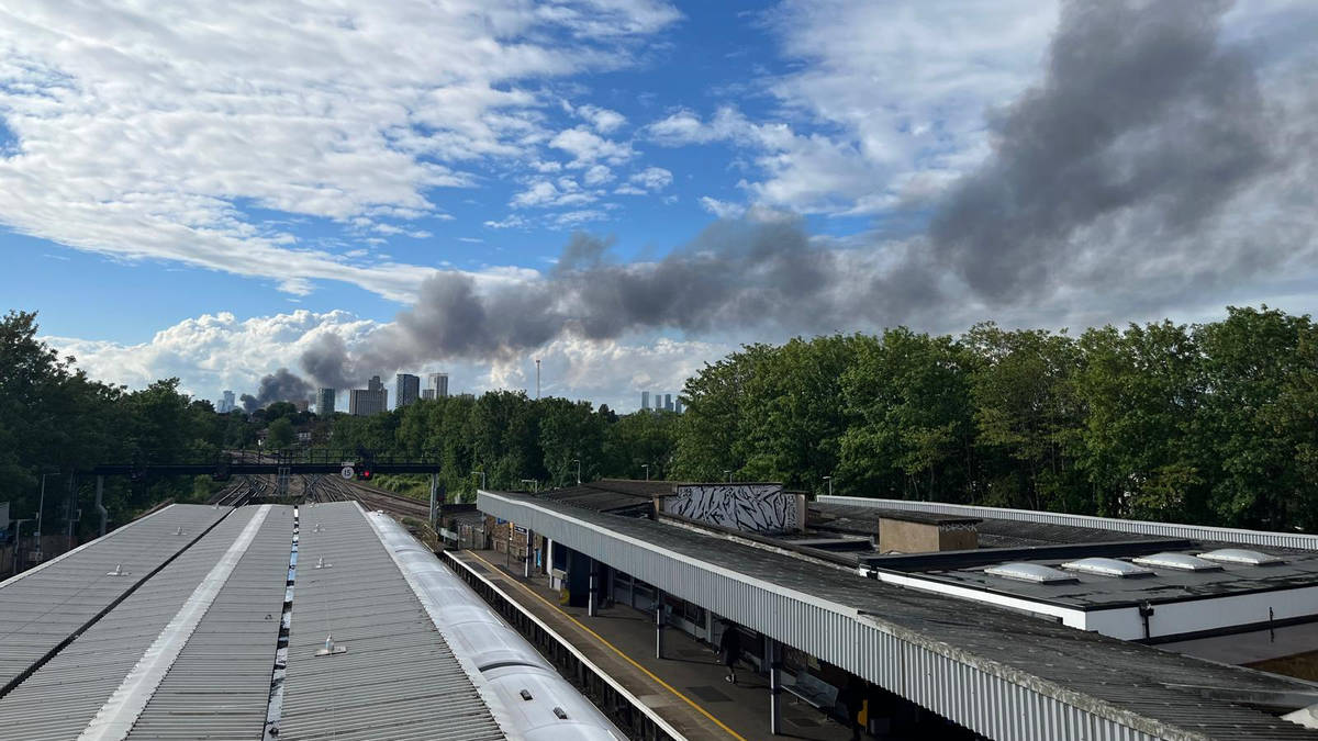 Smoke visible across London as 100 firefighters tackle recycling centre ...